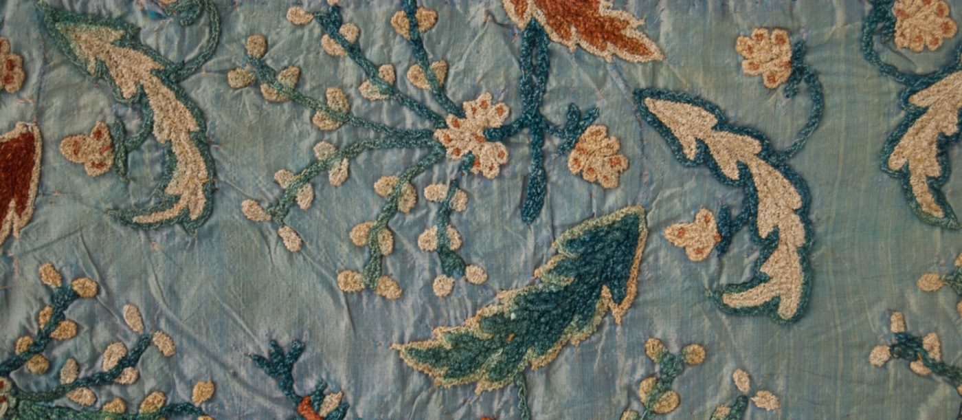 Embroidered art around the site | EGA